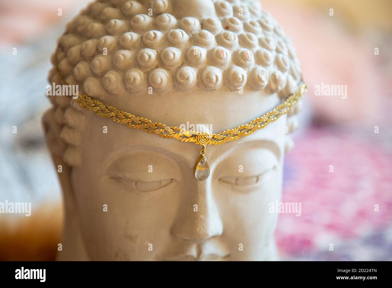 Brass tiara with gemstone on Buddha statue head Stock Photo - Alamy