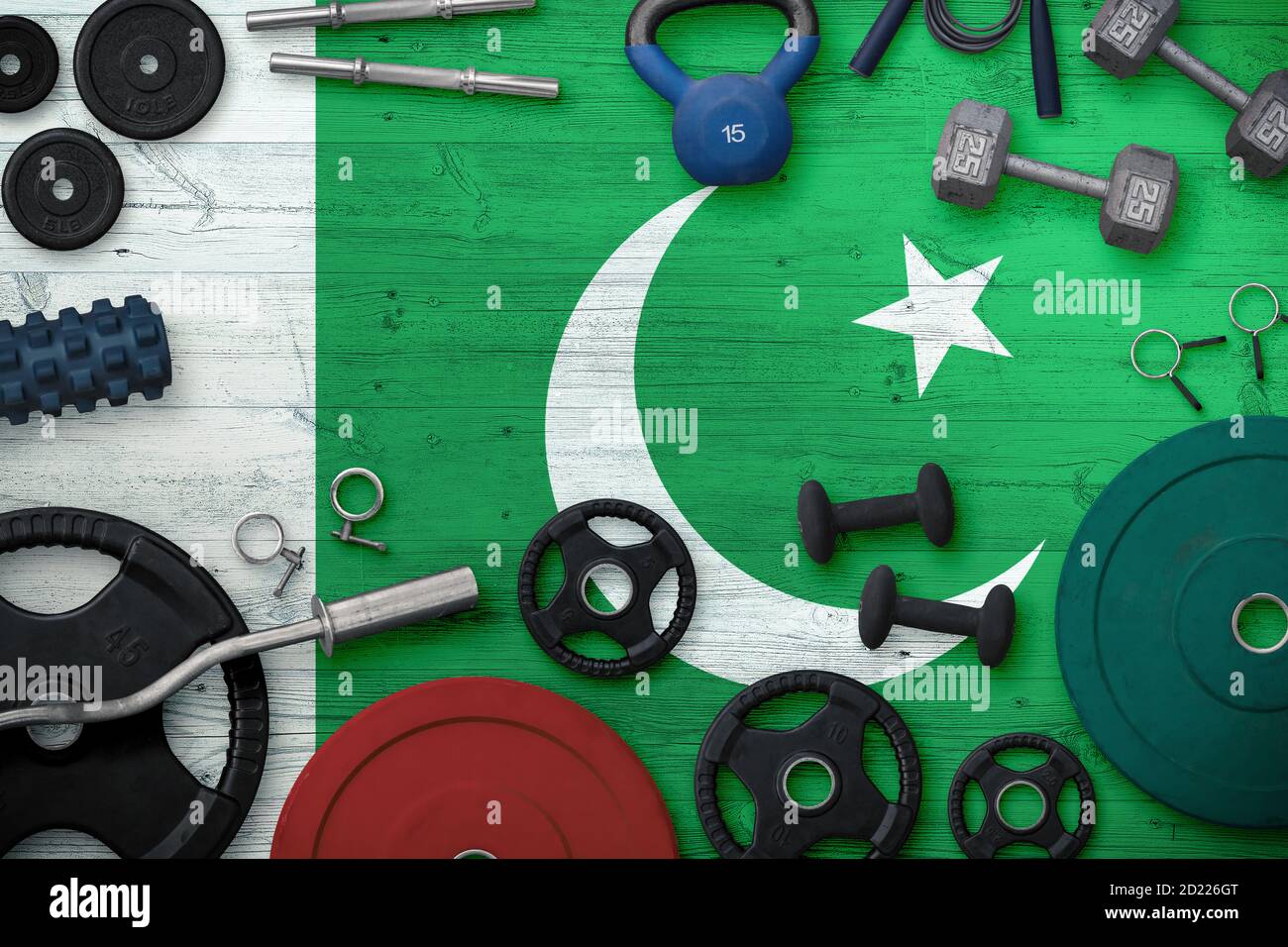 Pakistan sports and fitness concept. Top view of heavy weight plates ...