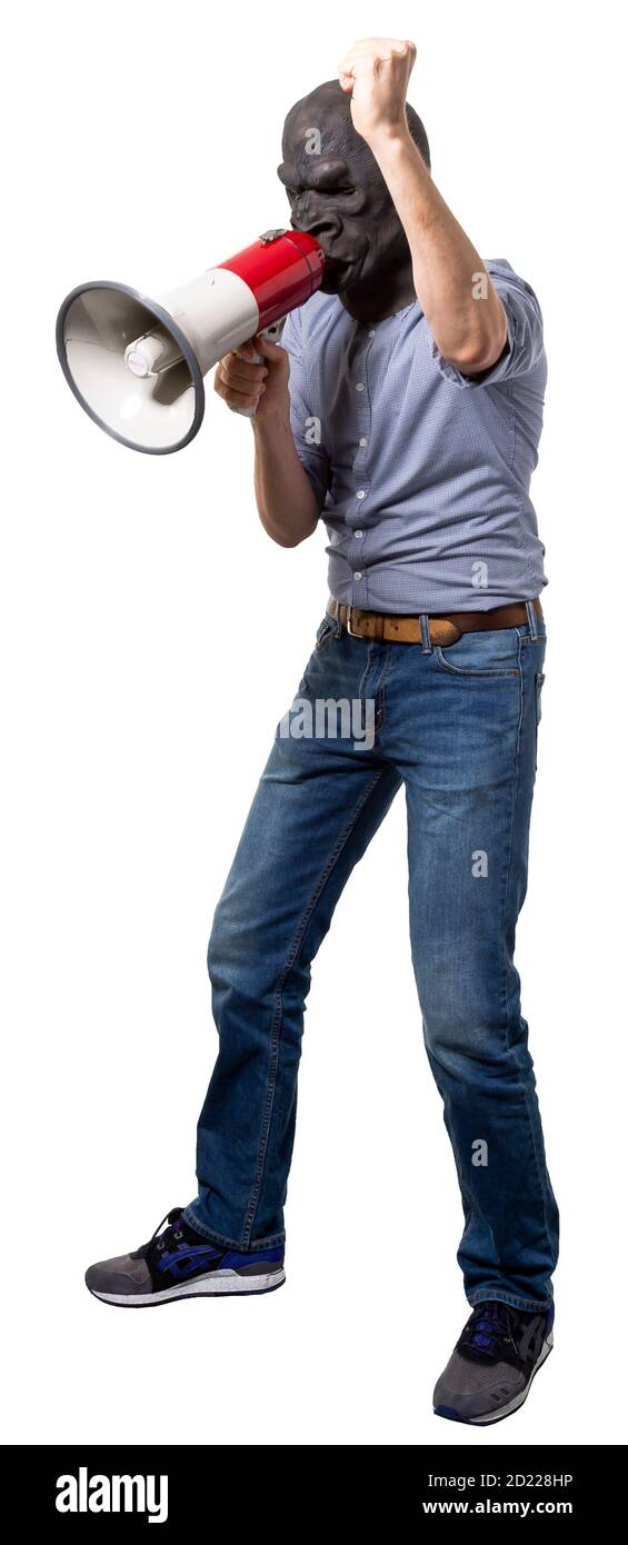 Man in gorilla mask yelling on megaphone with fist raised. Isolated ...