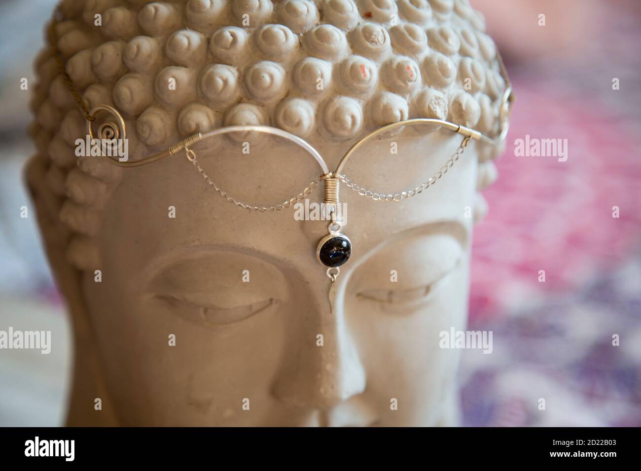 Brass tiara with gemstone on Buddha statue head Stock Photo - Alamy