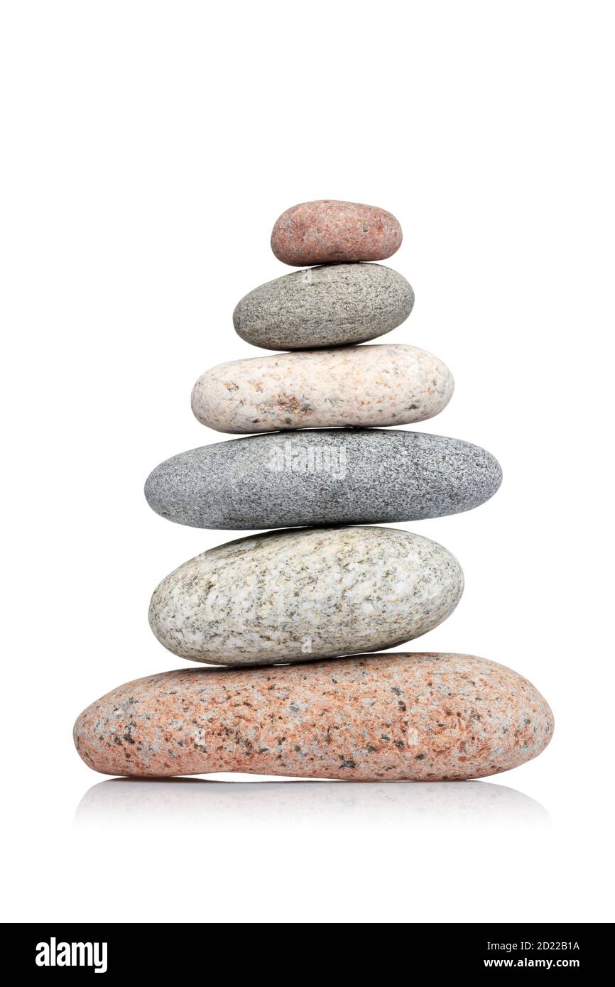 Balancing pyramid of stones isolated on white background Stock Photo ...