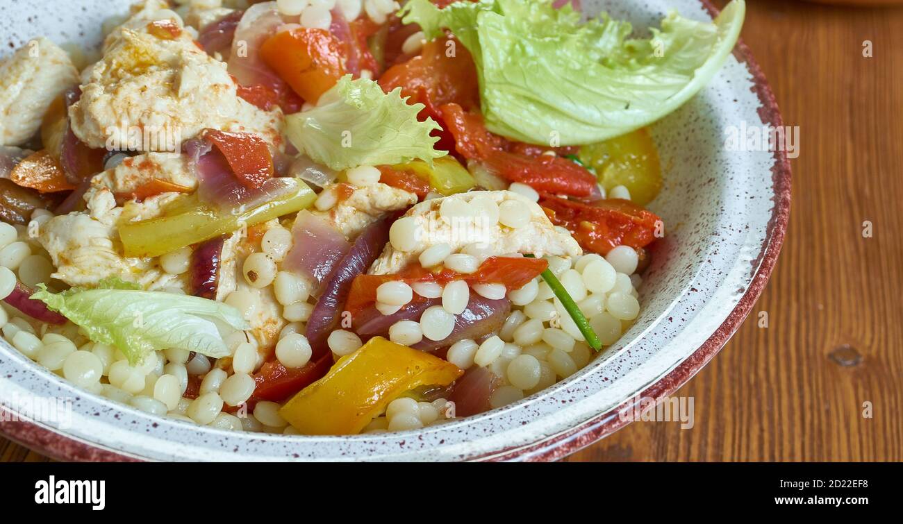 Israel Ptitim casserole with chicken and vegetables . Middle Eastern ...