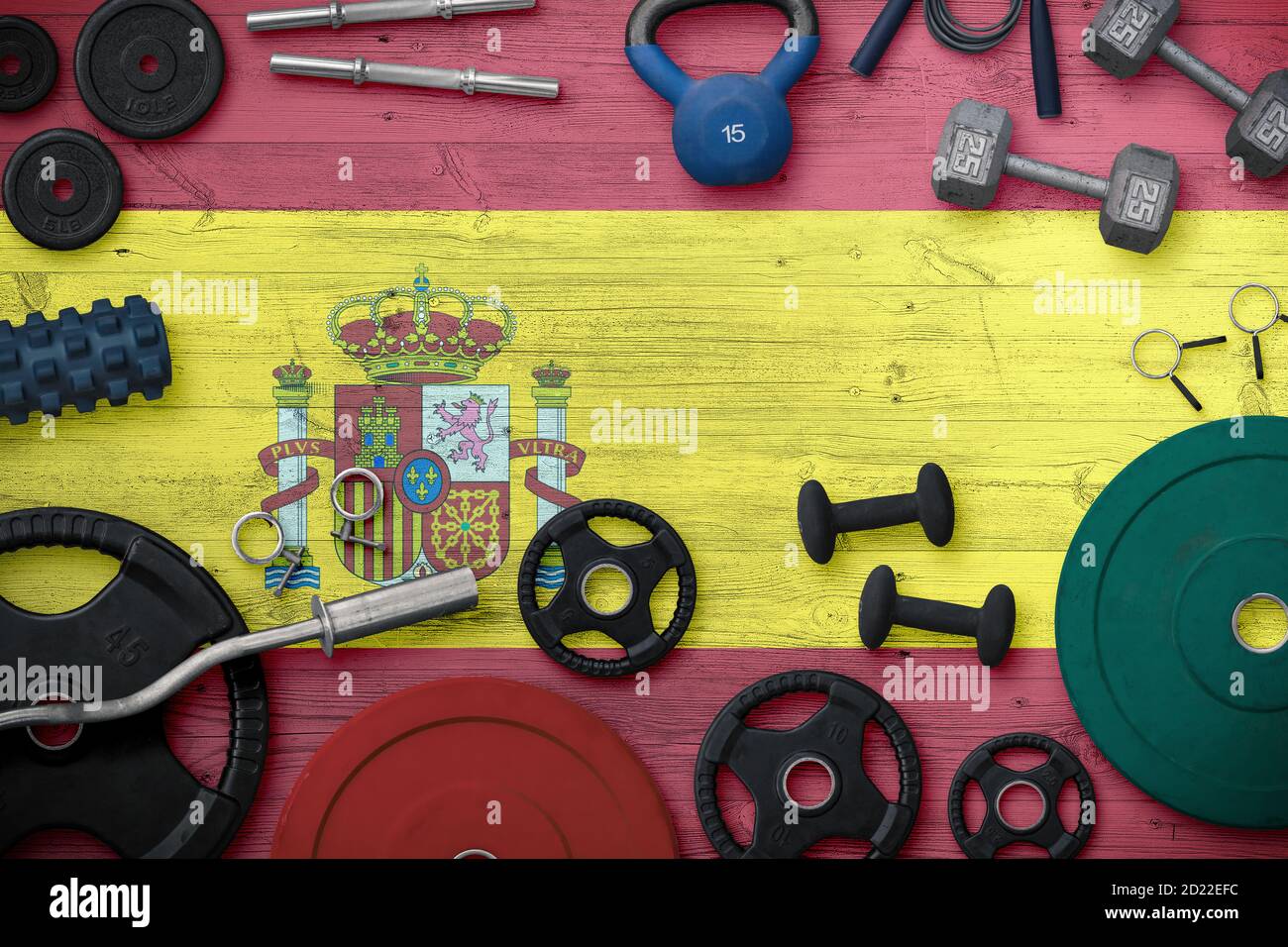 Spain sports and fitness concept. Top view of heavy weight plates with ...