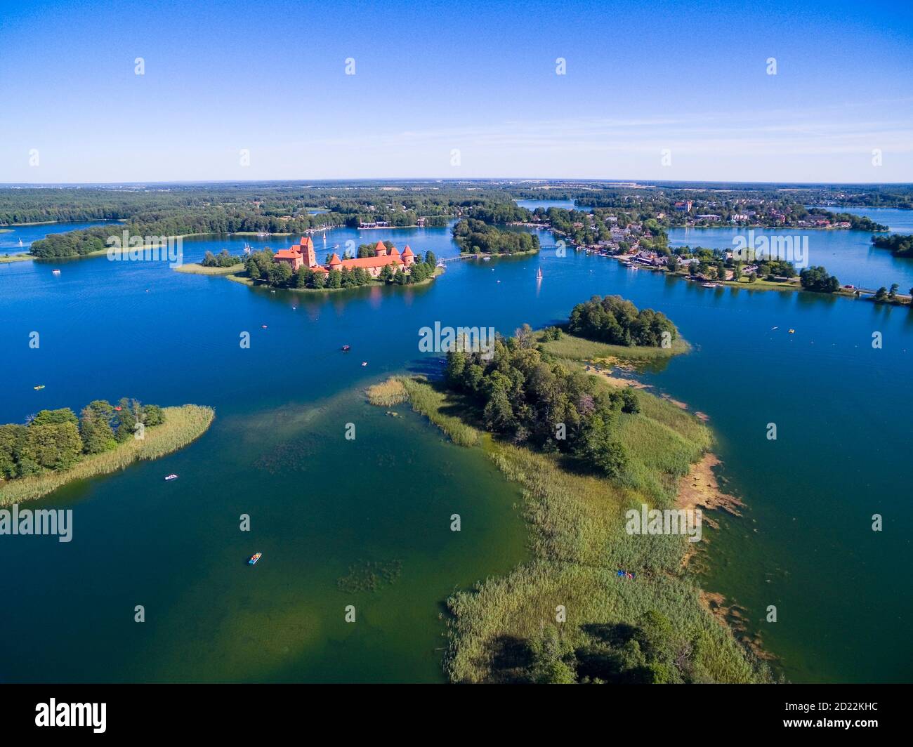 Aerial view of beautiful Gothic style red brick castle on an island on ...