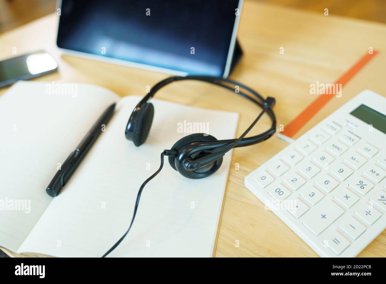 Headphones and school supplies Teleconference using lesson online ...