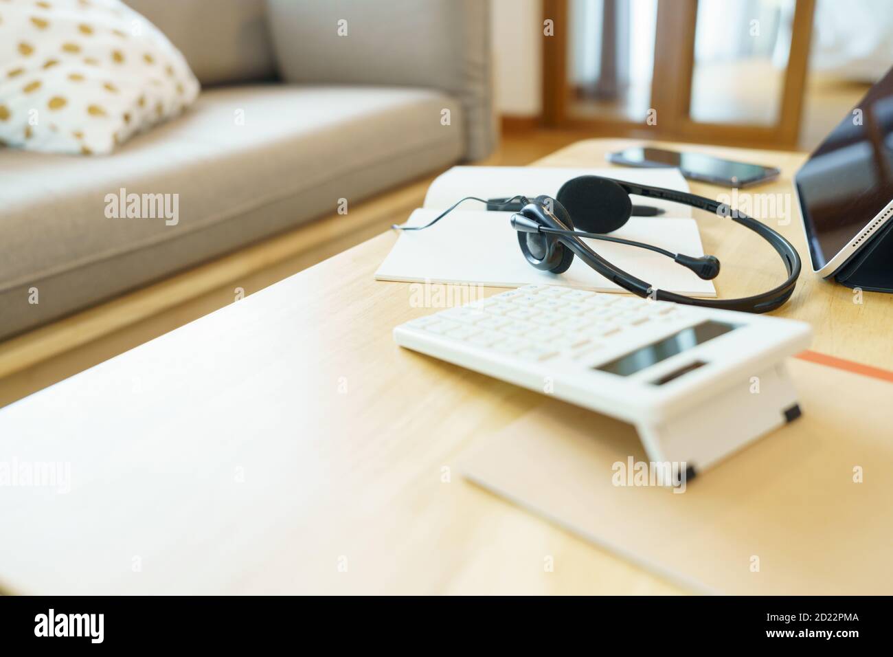 Headphones and school supplies Teleconference using lesson online ...