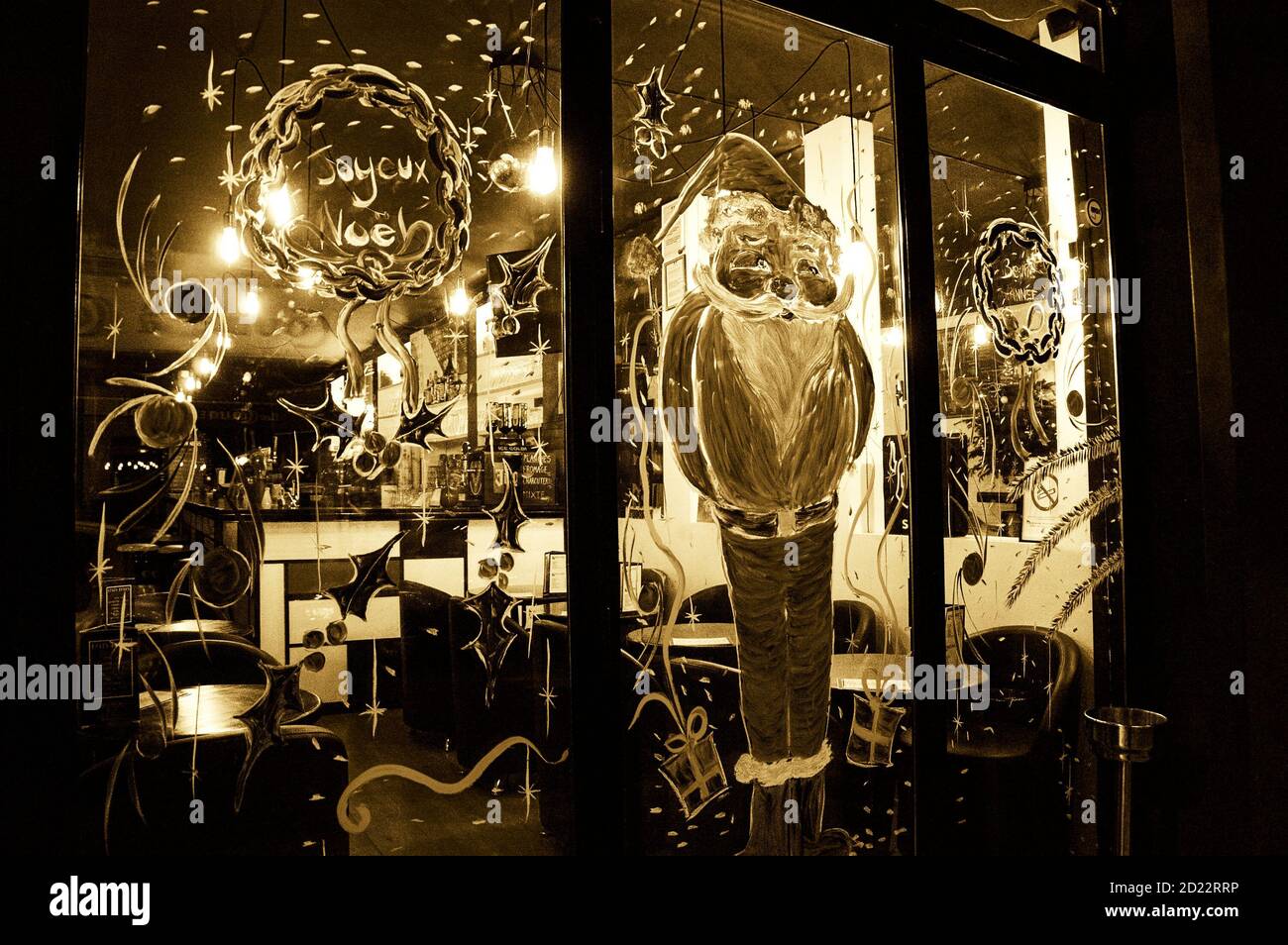 PARIS, FRANCE - DECEMBER 18, 2016: Parisian cafe windows decorated for ...
