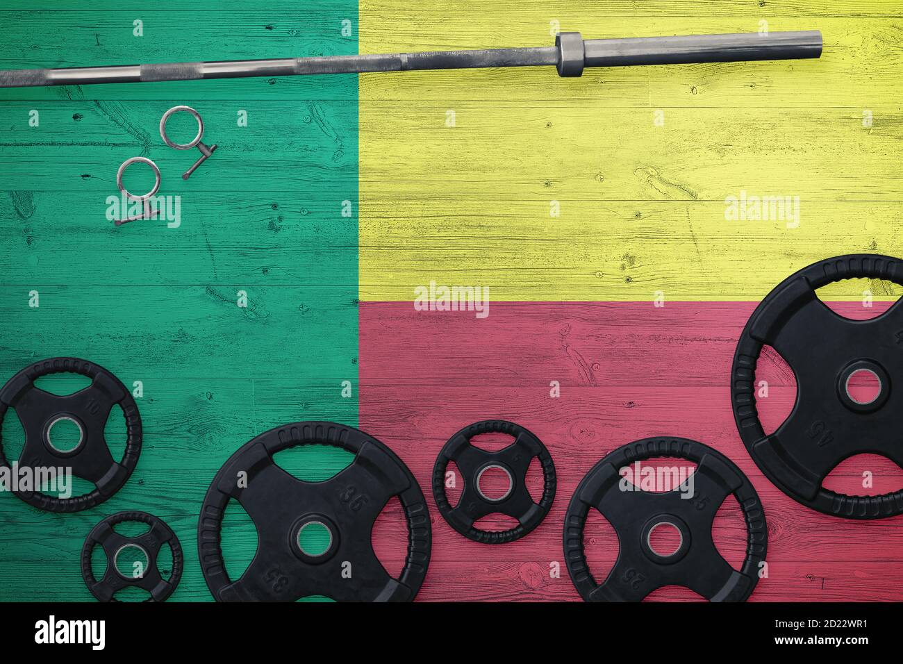 Benin gym concept. Top view of heavy weight plates with iron bar on ...