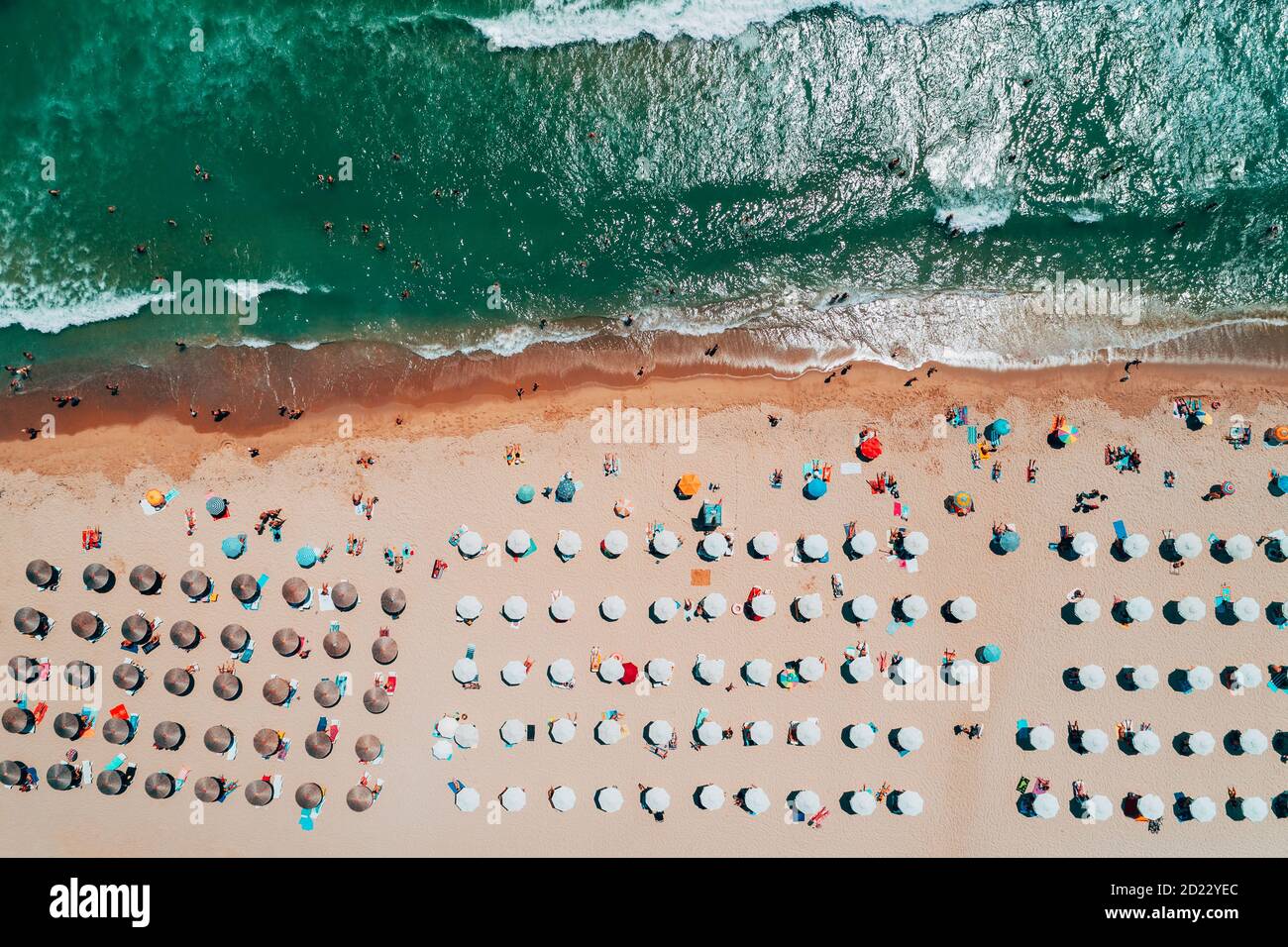 Aerial top view on the beach. Umbrellas, sand and sea waves Stock Photo ...