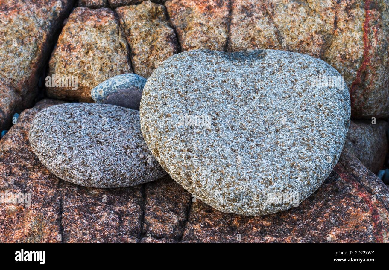 Heart shaped rock found on coastal rocky beach Stock Photo - Alamy