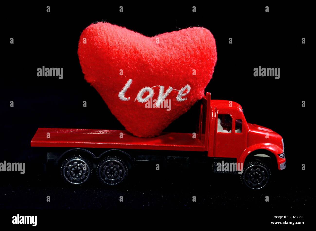 Valentine love truck carrying heart hi-res stock photography and images ...
