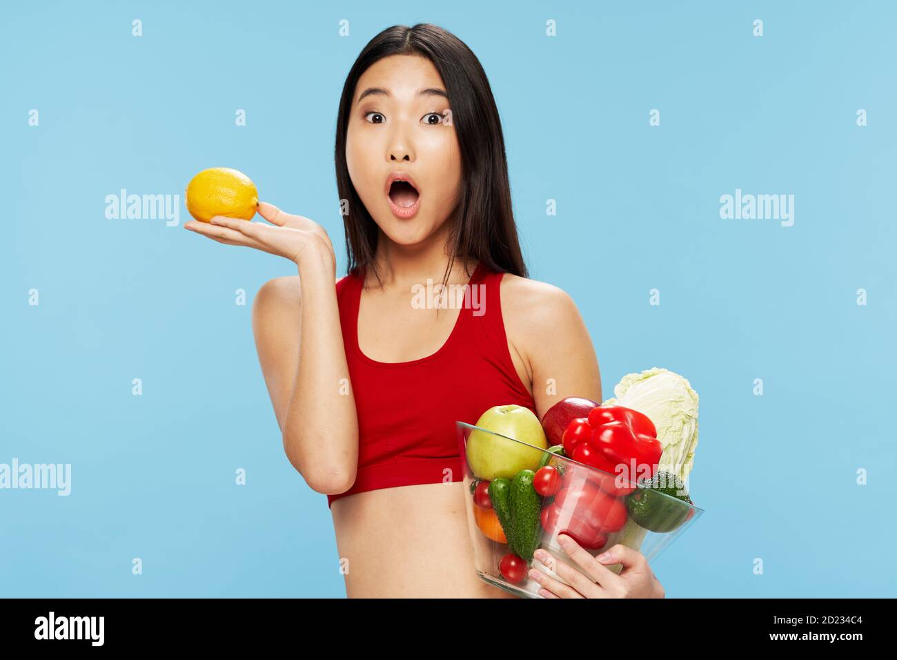 Young woman bowl fruit model hi-res stock photography and images - Alamy