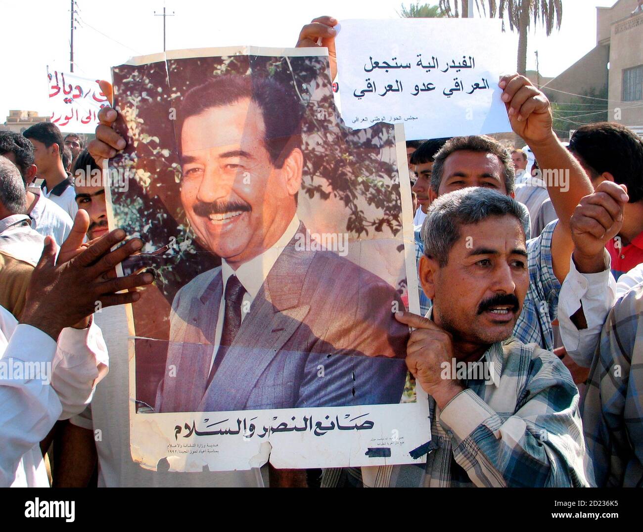 Saddam hussein poster hi-res stock photography and images - Alamy