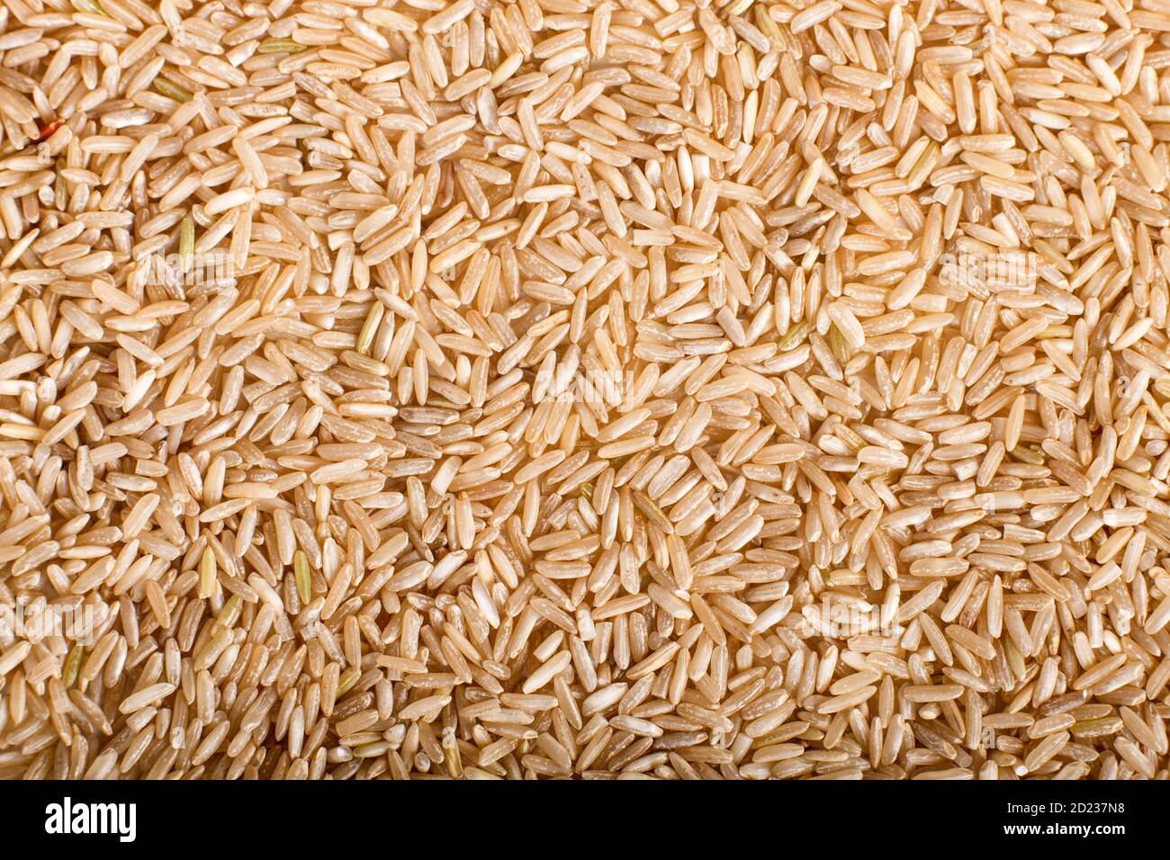 Texture of brown rice. Top view Stock Photo - Alamy