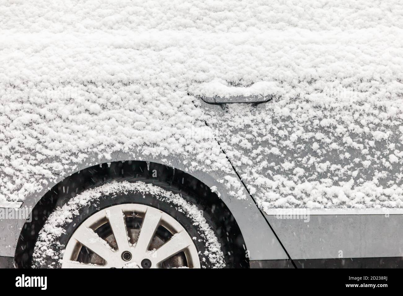 Car wheel covered in snow hi-res stock photography and images - Alamy