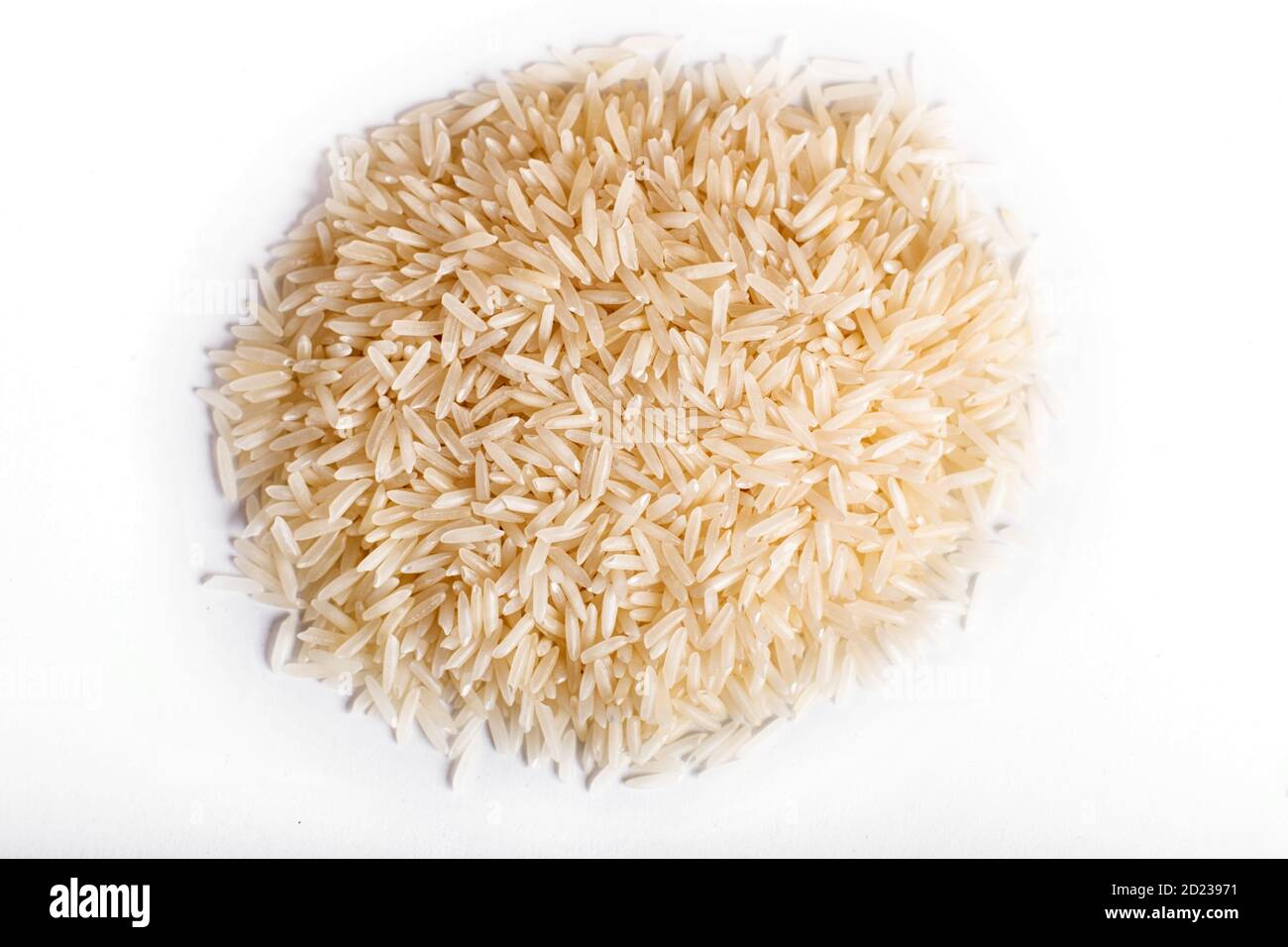 Pile of basmati rice isolated on white background. Top view Stock Photo ...