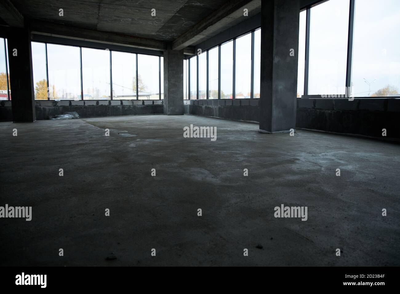 Filling the floor with concrete, screed and leveling the floor. Smooth ...