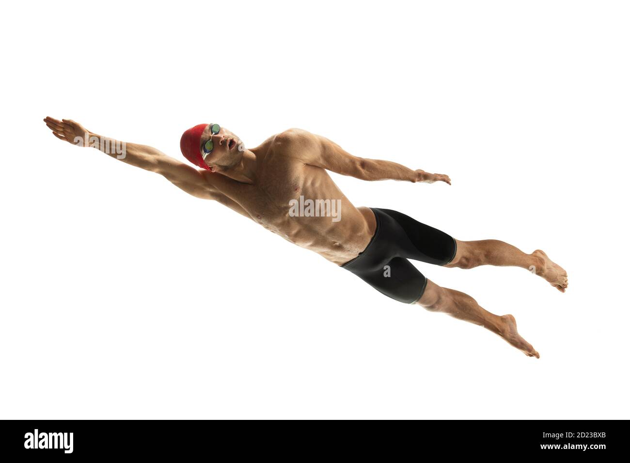 Freedom. Caucasian professional sportsman, swimmer training isolated on ...