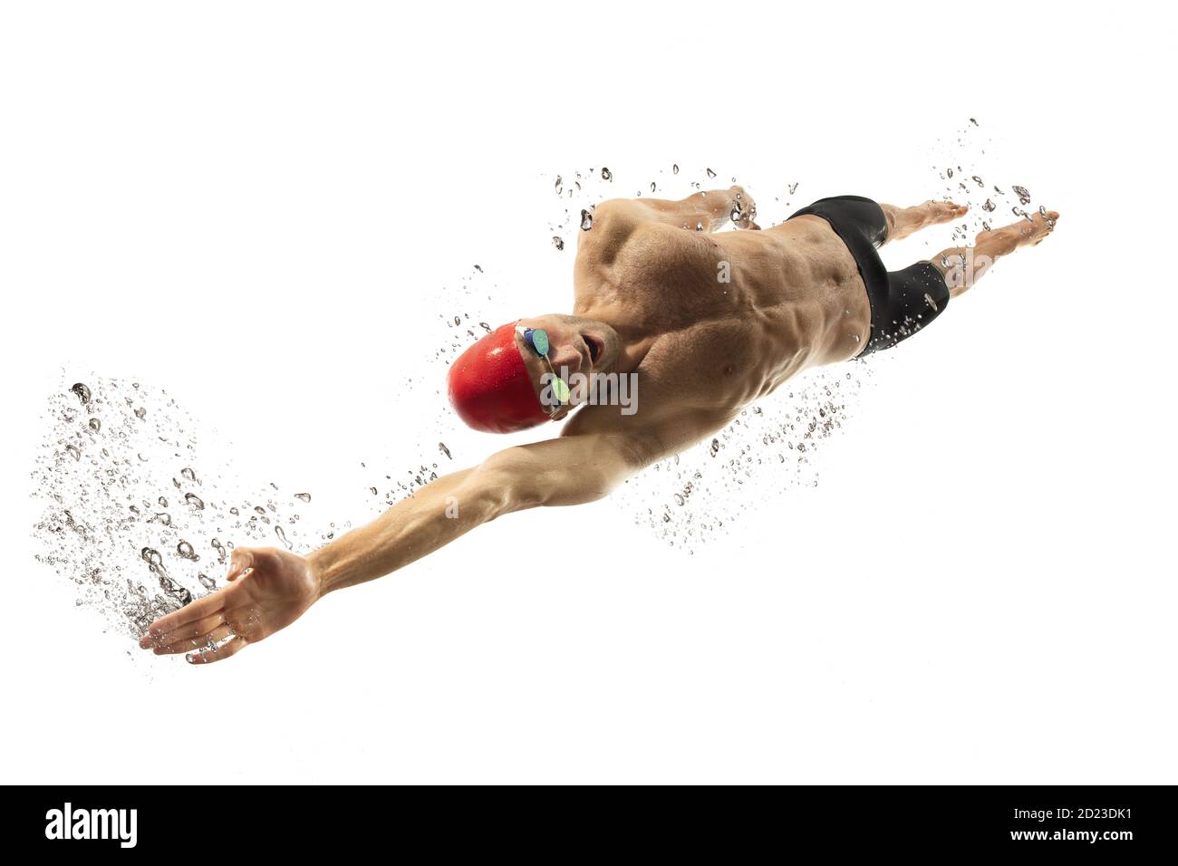 Dynamic. Caucasian professional sportsman, swimmer training isolated on ...