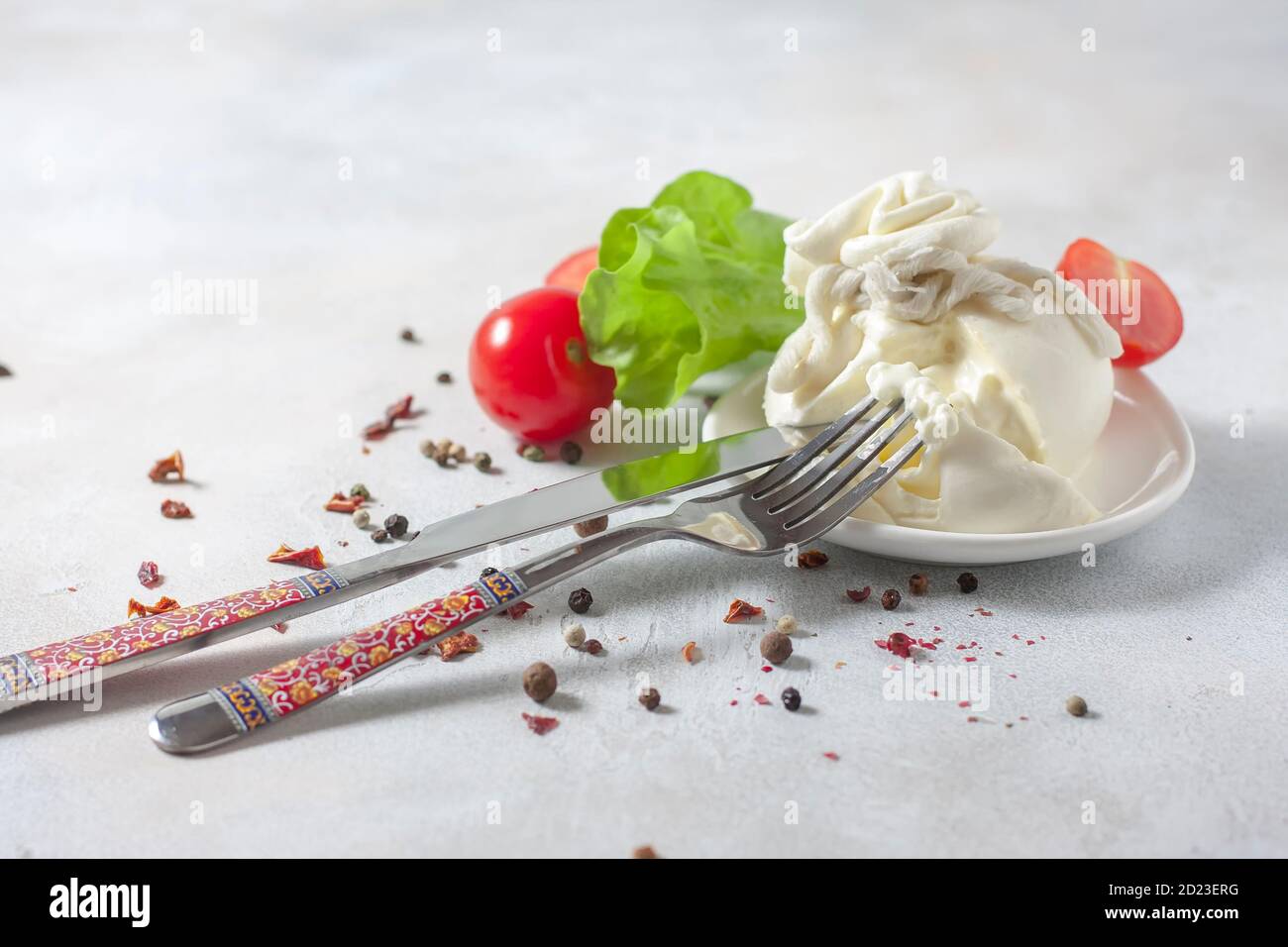 Italian Cream Burrata Cheese on light background Stock Photo - Alamy