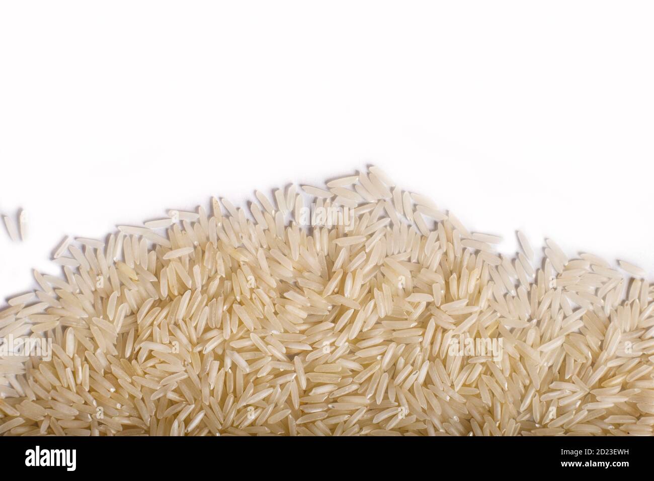 Texture of basmati rice isolated on white background. Top view. Copy ...