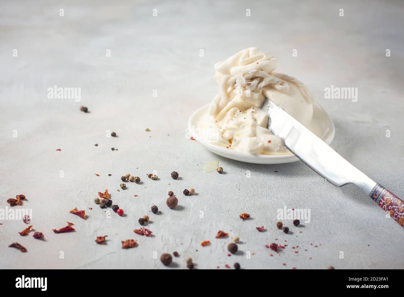 Italian Cream Burrata Cheese on light background Stock Photo - Alamy