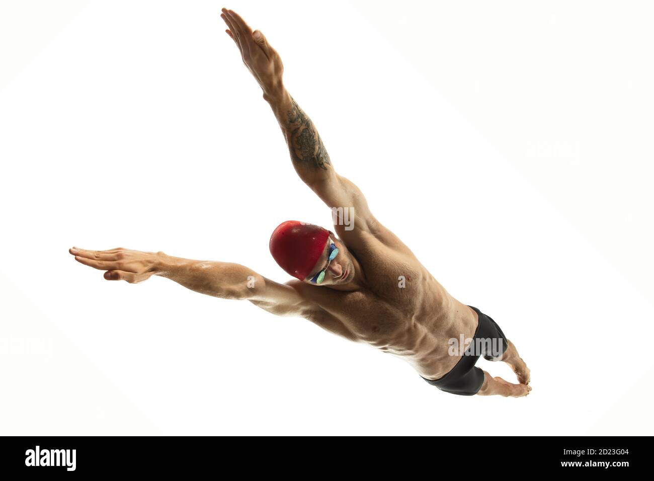 Dynamic. Caucasian professional sportsman, swimmer training isolated on ...