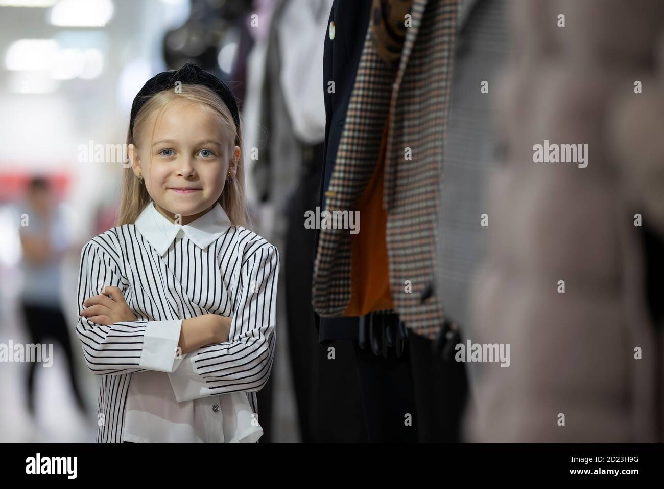 A beautiful little girl in the store Stock Photo - Alamy