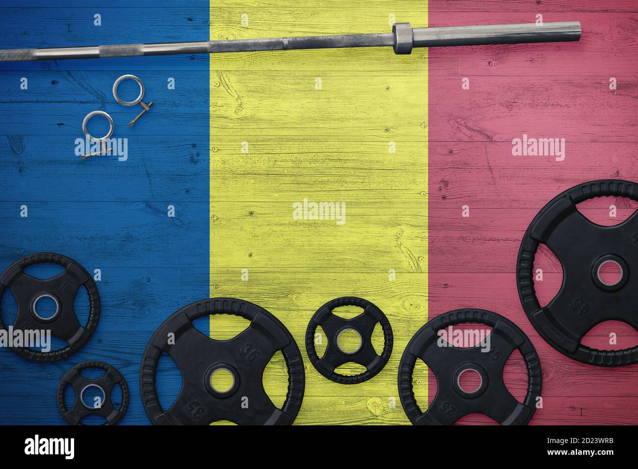 Romania gym concept. Top view of heavy weight plates with iron bar on ...