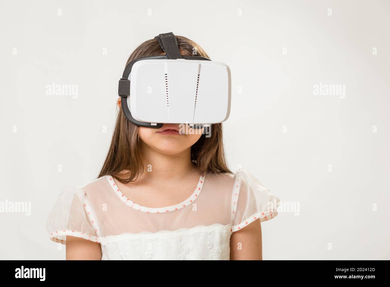 Young girl wearing virtual reality VR goggles Stock Photo - Alamy
