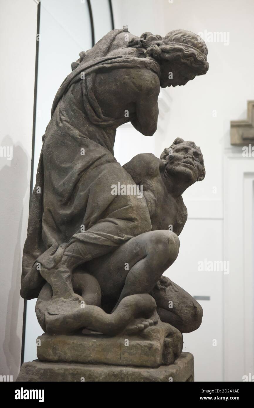 Badly damaged remains of the original Baroque statue of the Angel ...