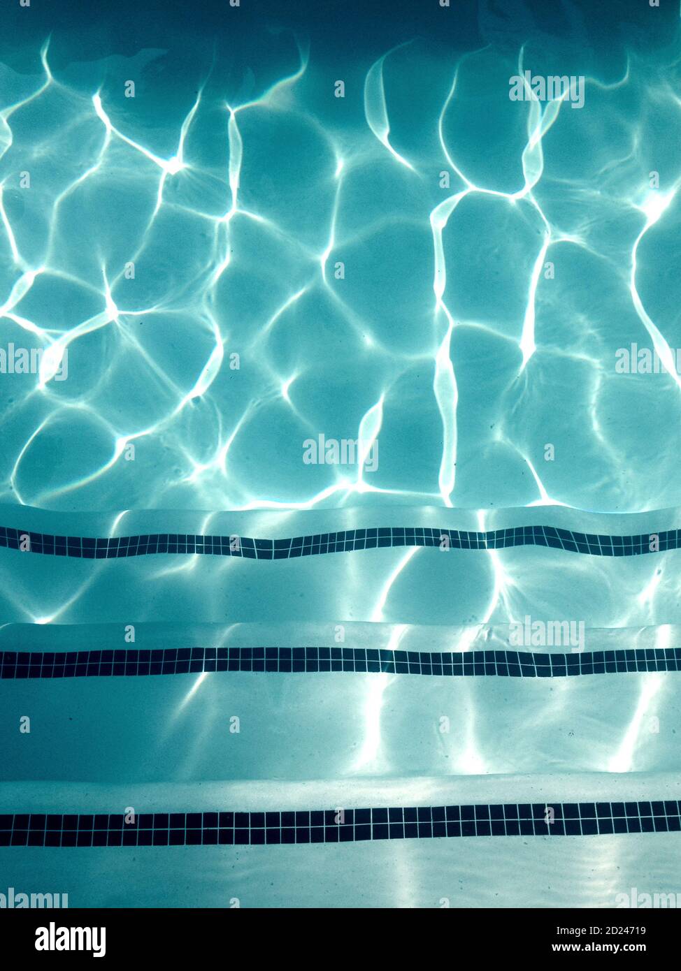 Reflecting water in a swimming pool giving interesting pattern Stock ...