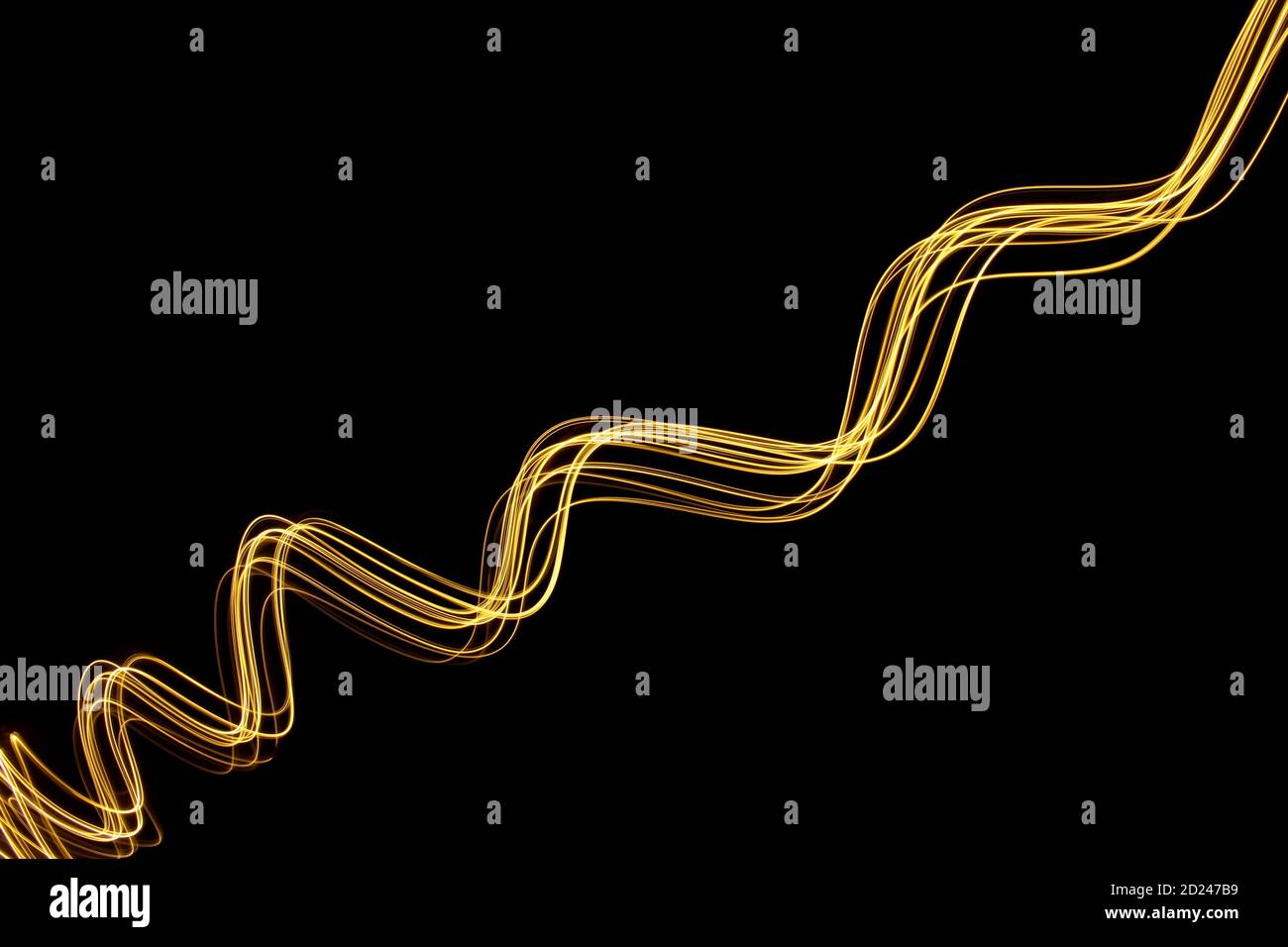 Long exposure photograph of neon colour in an abstract swirl, parallel ...