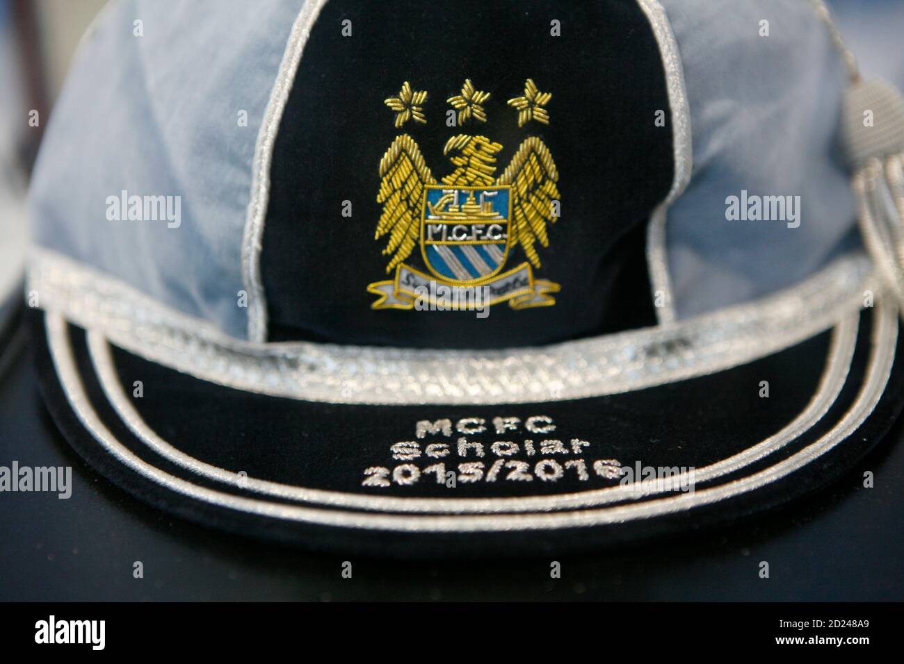 MCFC Academy Academy Scholars Hat Stock Photo - Alamy