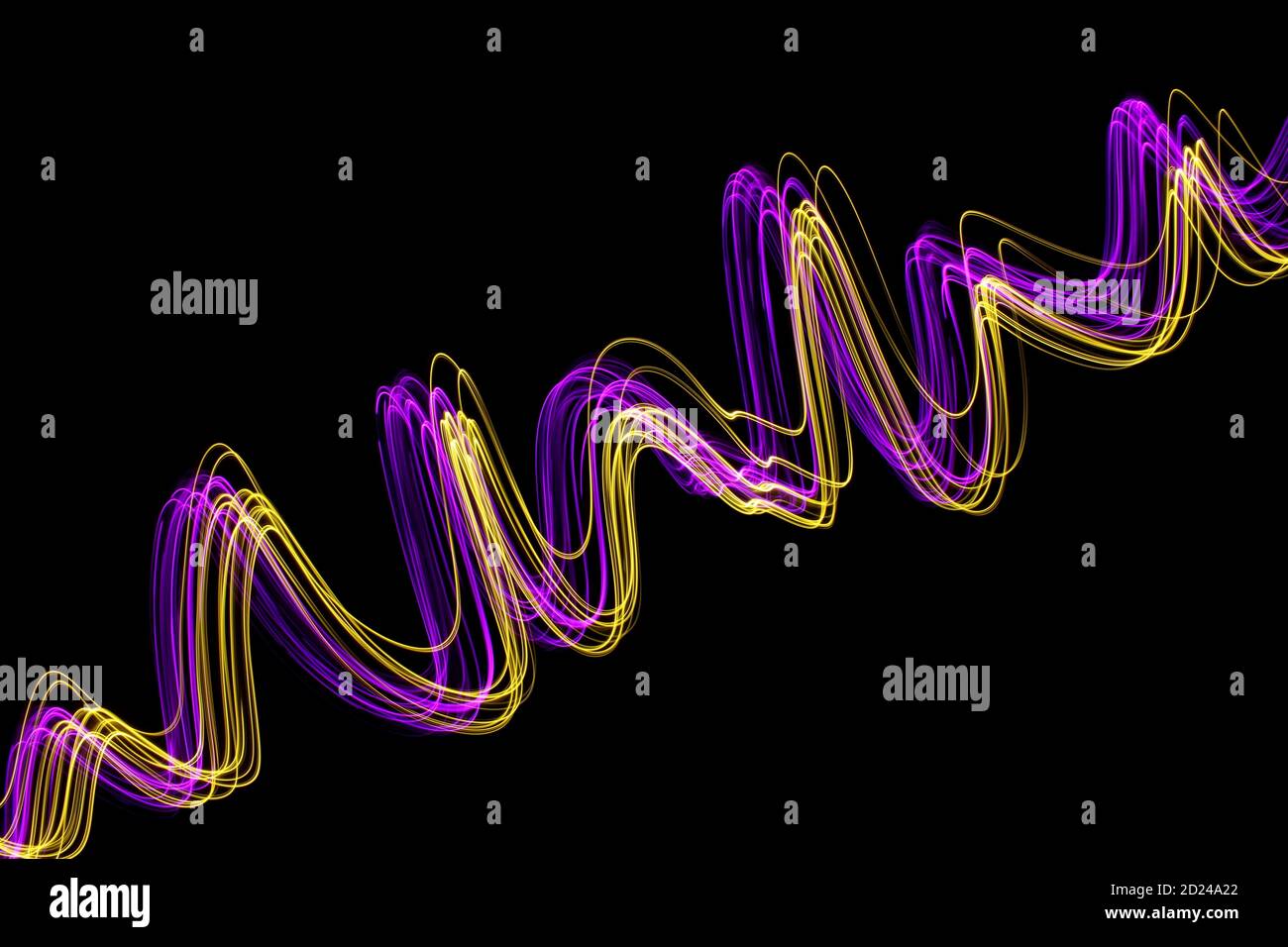 Long exposure photograph of neon colour in an abstract swirl, parallel ...