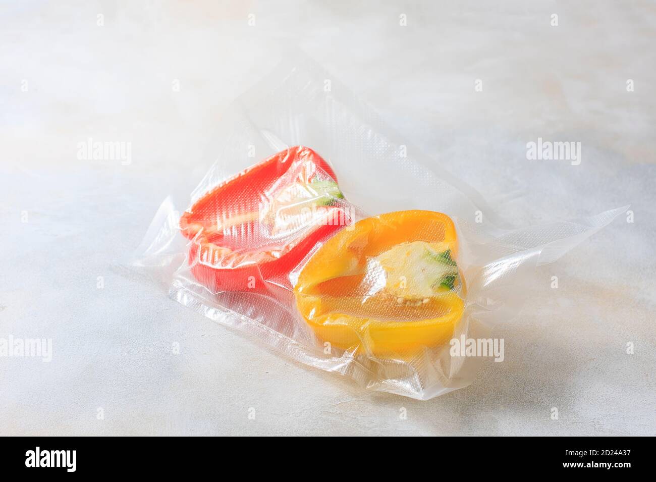 Vegetables in sealed vacuum packing bags. Su-video cooking Stock Photo ...