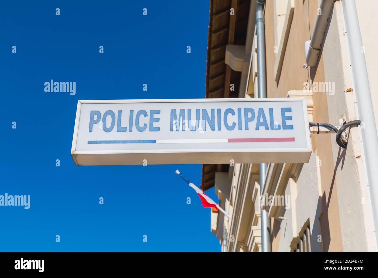 Police Municipale (municipal police) sign on the storefront of a local ...