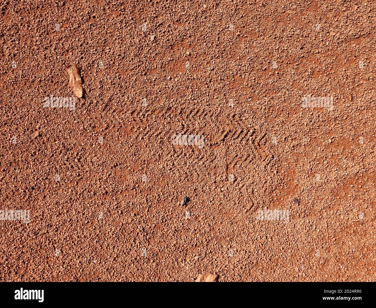 Detail of sport shoe footprint on a tennis clay court. Detailed sand ...