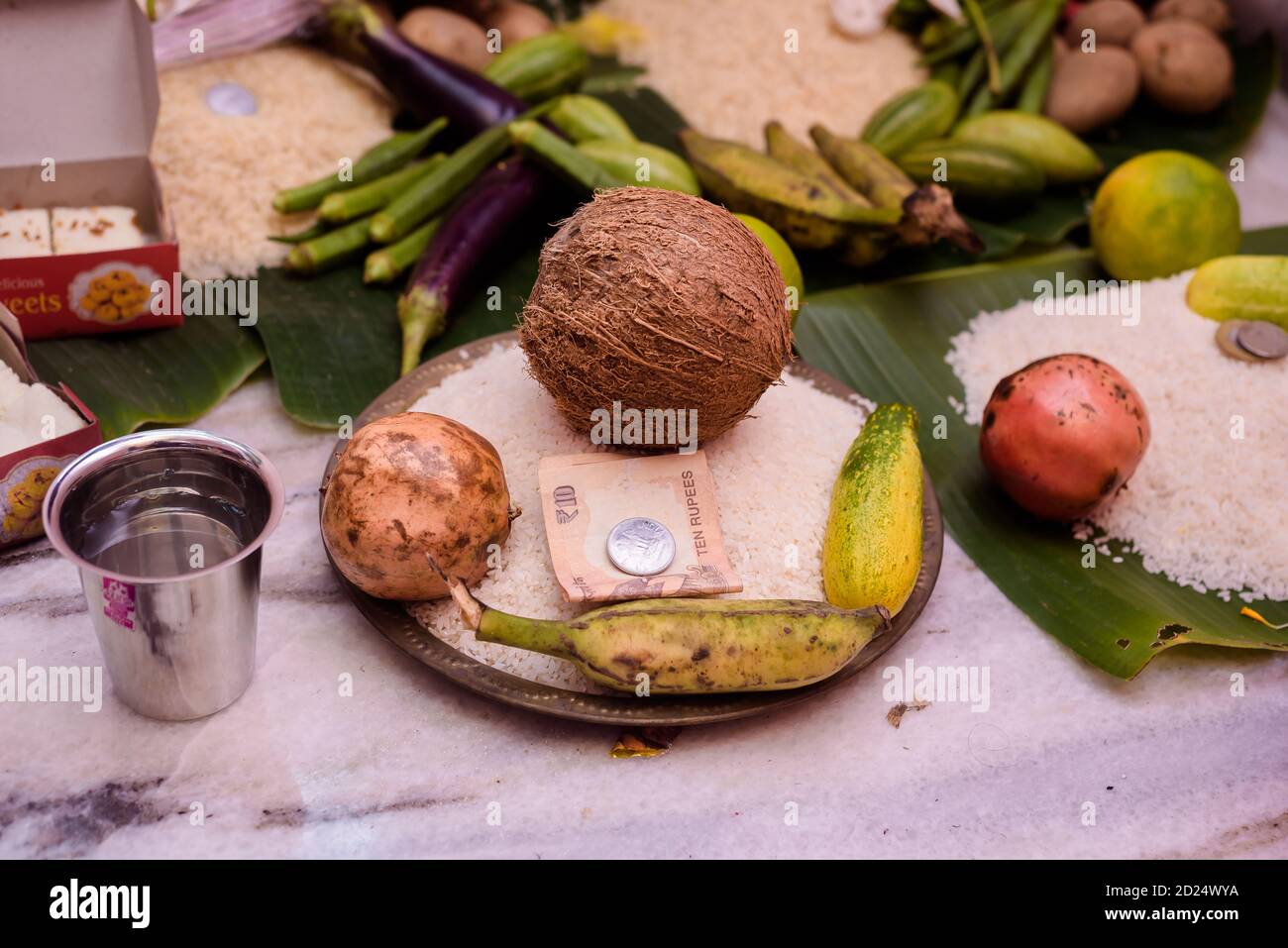 Food material served in banana leaf during a ritual of rice ceremony in ...