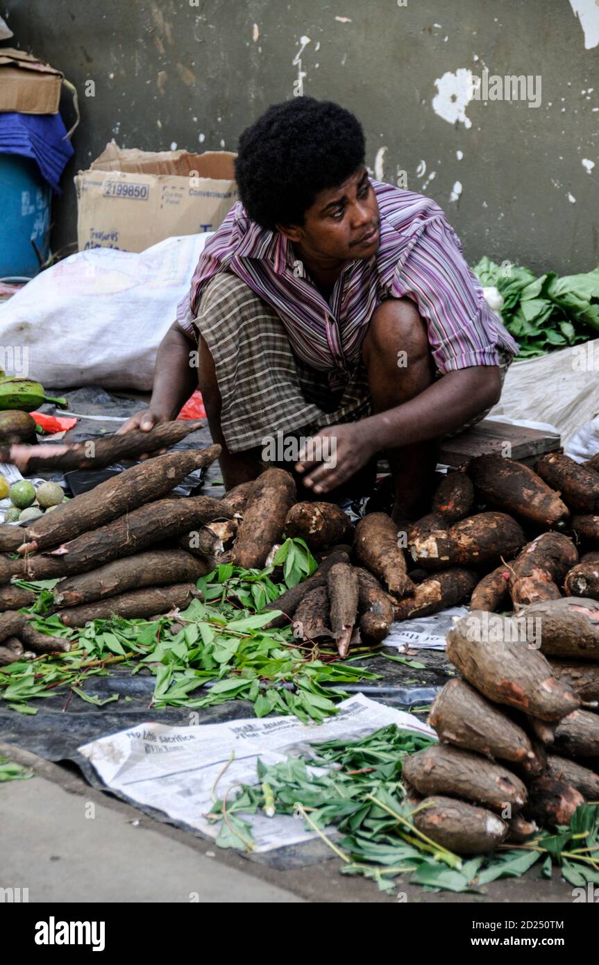 A street vendor selling Casava, a national Fiji root crop at a fruit ...