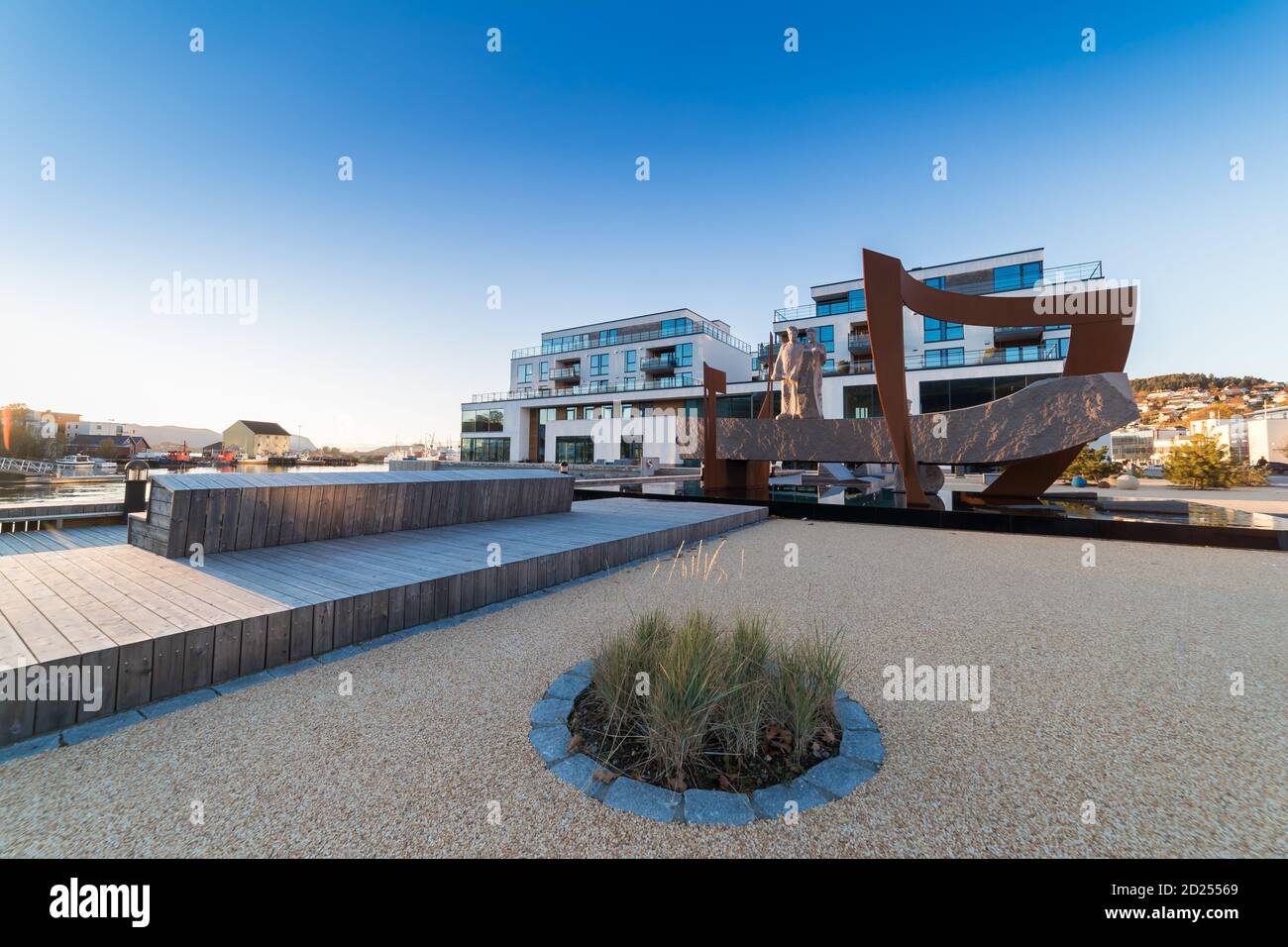 ULSTEINVIK, NORWAY - 2016 NOVEMBER 06. Park with statue in the centrum ...