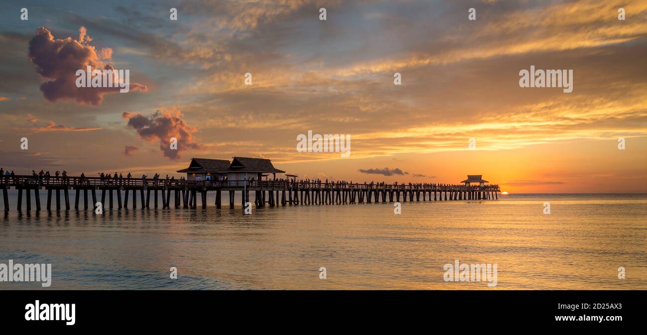 Colorful sunset over the Naples Pier, Naples, Florida, USA Stock Photo ...