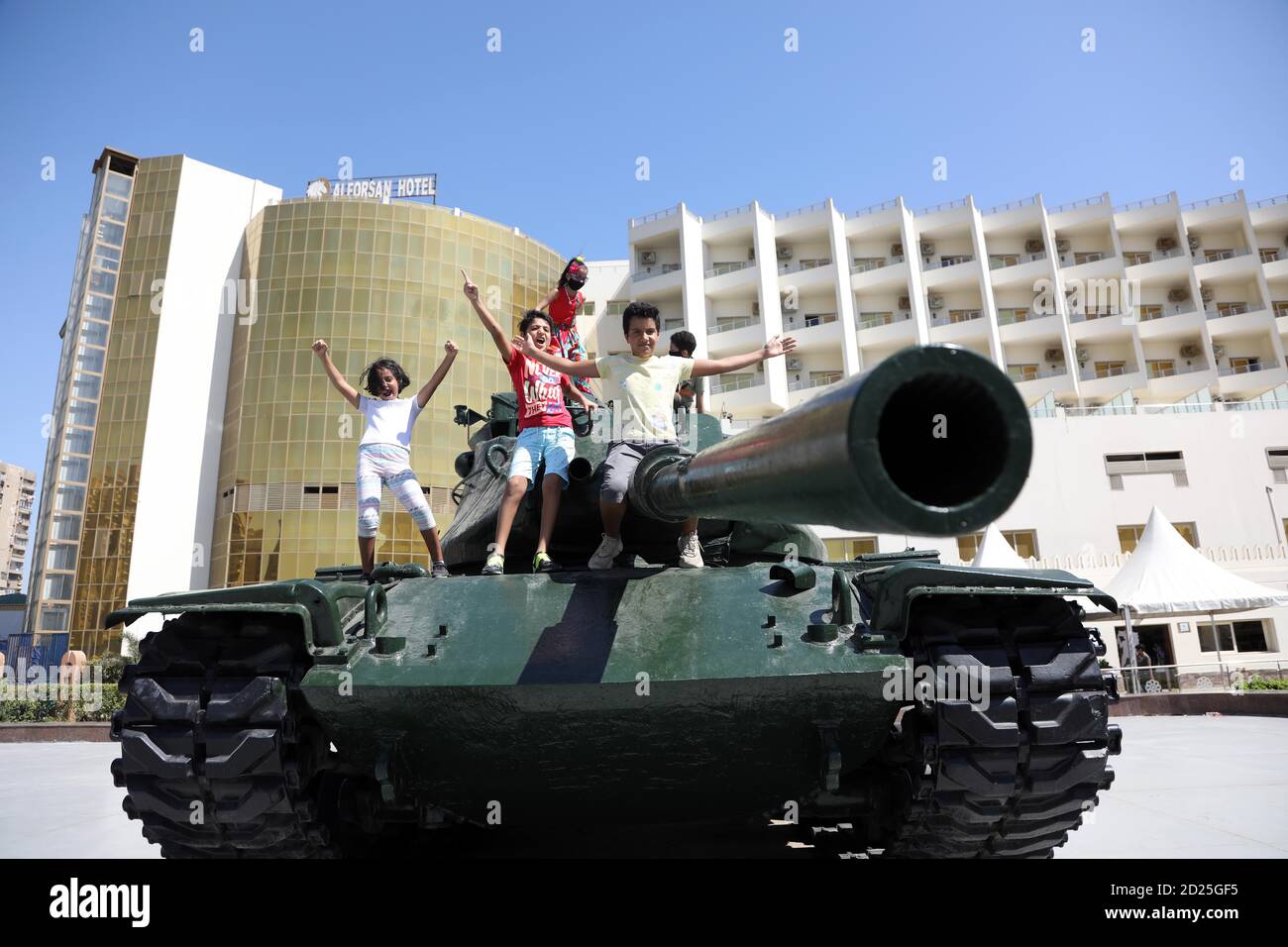 Cairo, Egypt. 6th Oct, 2020. Children pose for photos at the 6th of ...