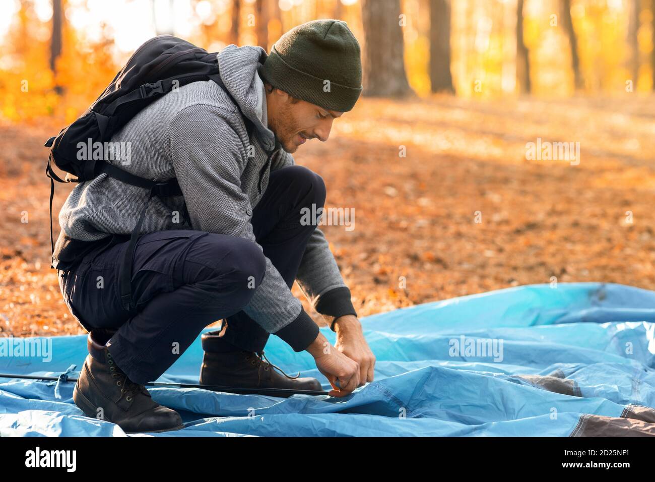 Camping man tent hi-res stock photography and images - Alamy