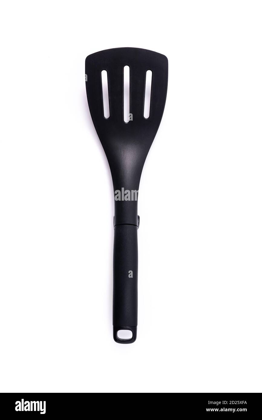 Black kitchen spatula isolated on white background Stock Photo - Alamy