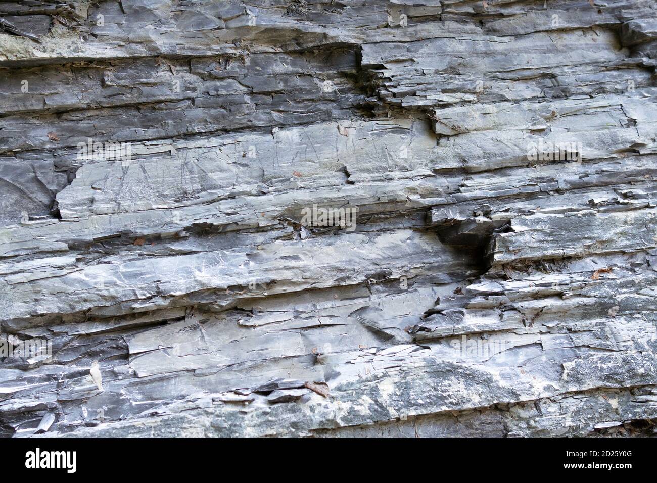 background layers in sedimentary rock on cliff face. Cliff of rocky ...