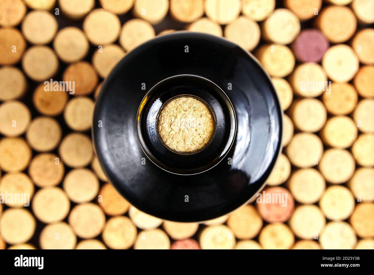 corked glass bottle of red wine, top view. Background pattern of used ...