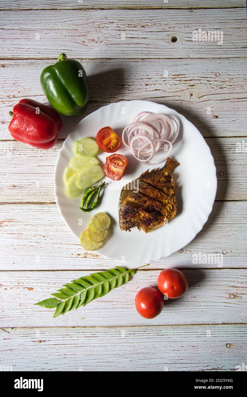 Top view of Tandoori pomfret fish, an Indian delicacy Stock Photo - Alamy
