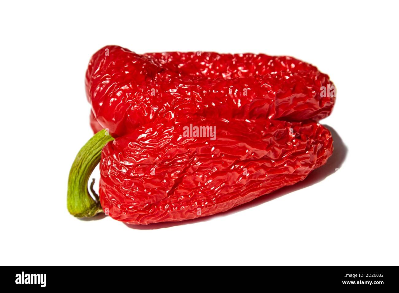 Spoiled wrinkled red pepper isolated on white background Stock Photo ...