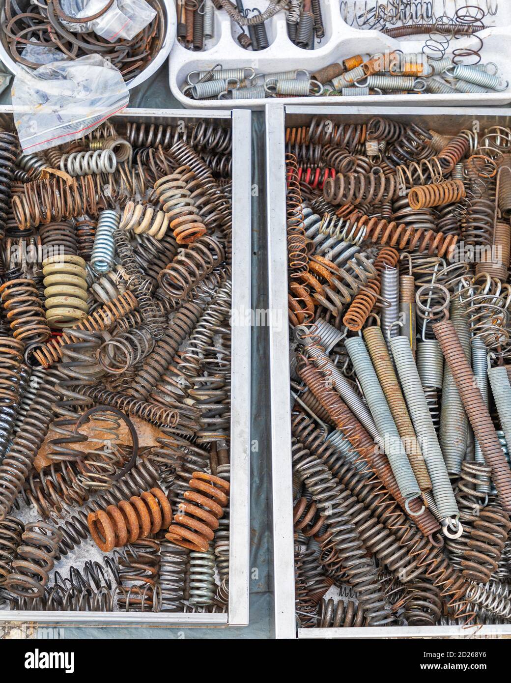 Various Springs Coils Spools Used Spare Parts Stock Photo - Alamy